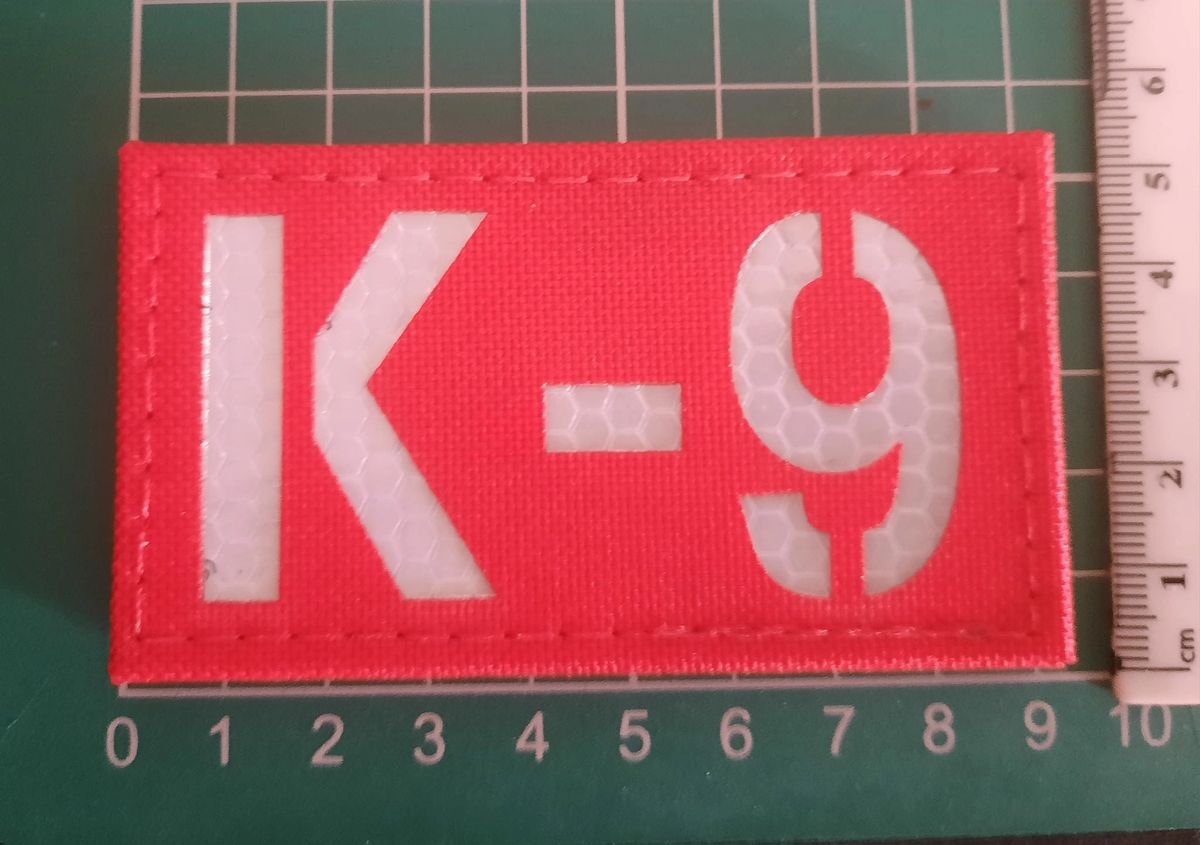 Red laser cut K-9 reflective patch